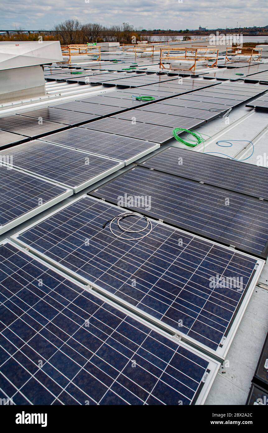 Commercial Solar Panel Installation on Roof Stock Photo - Alamy