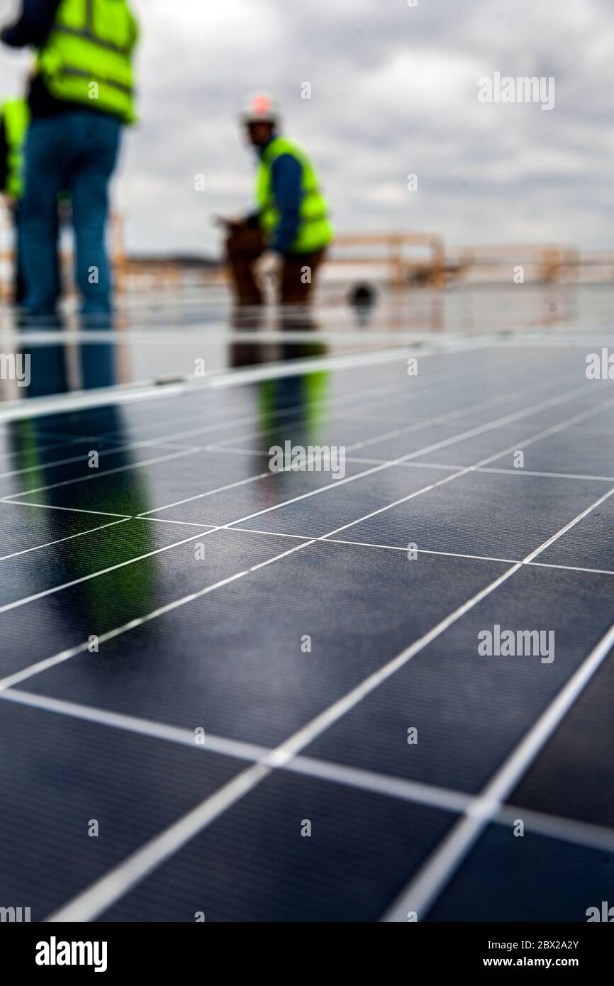 Commercial Solar Panel Installation on Roof Stock Photo - Alamy