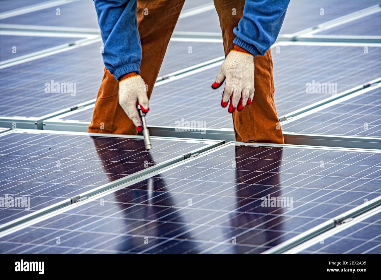 Commercial Solar Panel Installation on Roof Stock Photo - Alamy
