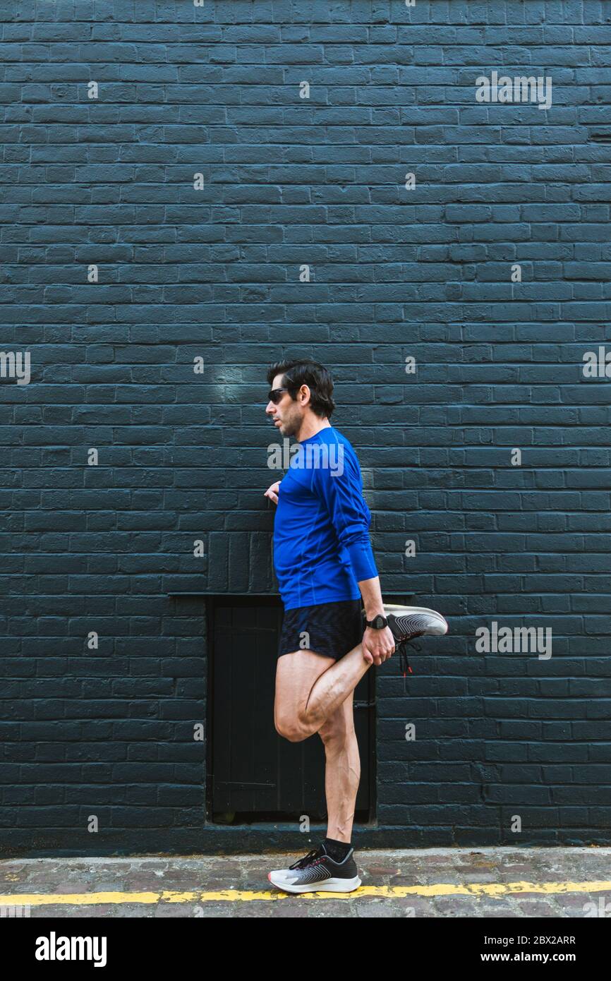 Hamstring stretch man hi-res stock photography and images - Alamy
