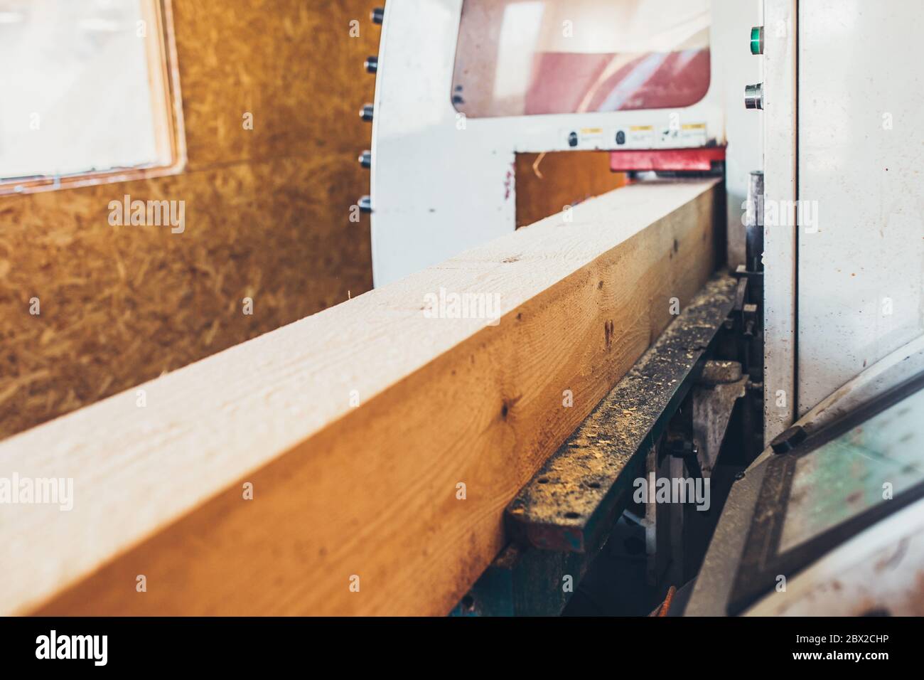 Woodworking on industrial machines - production of building materials ...