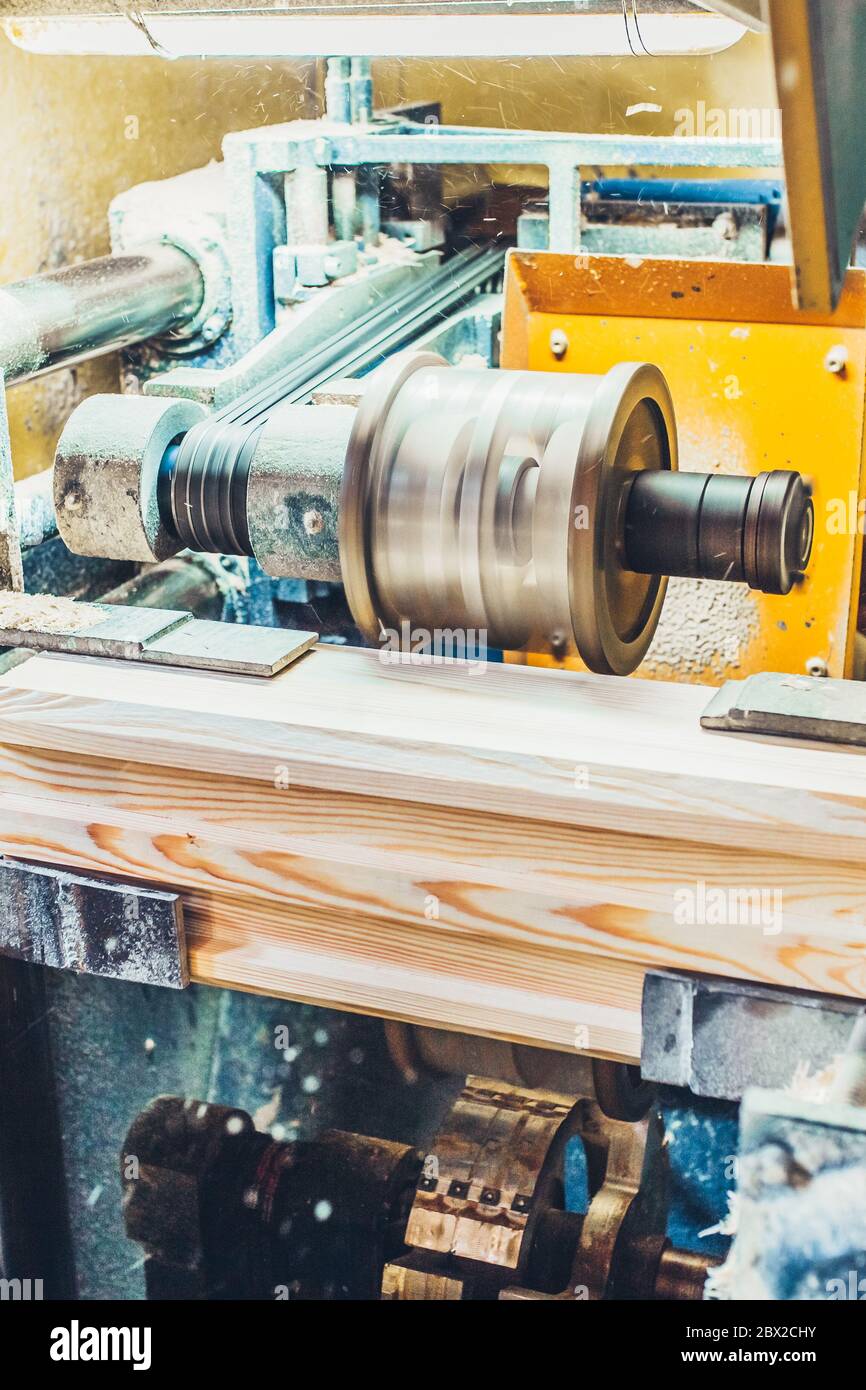 Woodworking on industrial machines - production of building materials ...