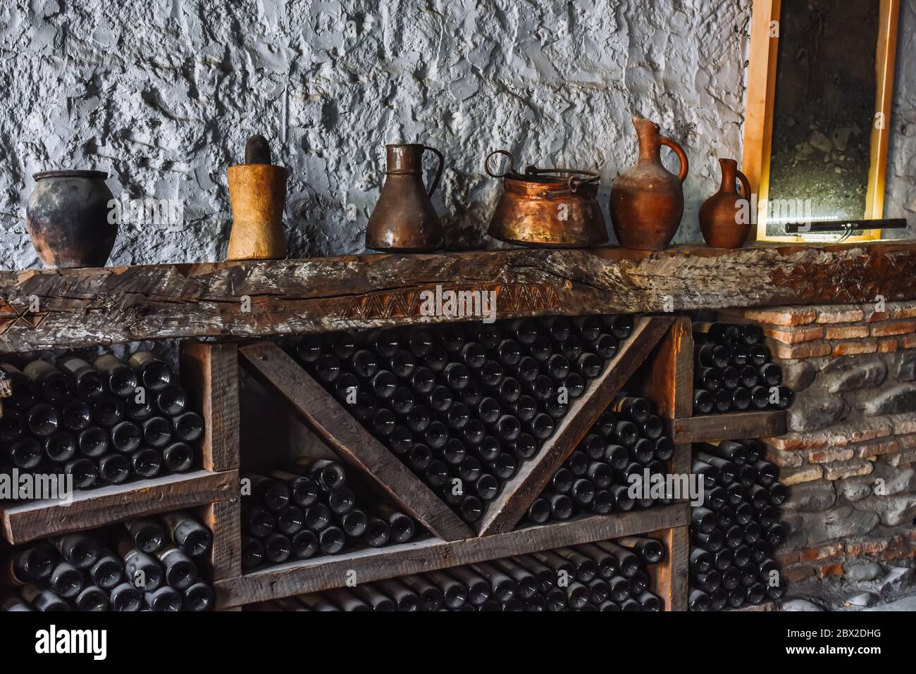 Old, ancient wine collection and dusty wine bottles in an underground ...