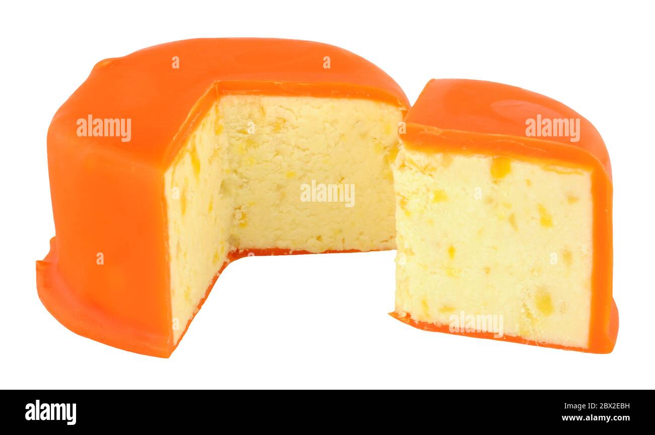 Orange wax covered mango and ginger Stilton cheese isolated on a white ...