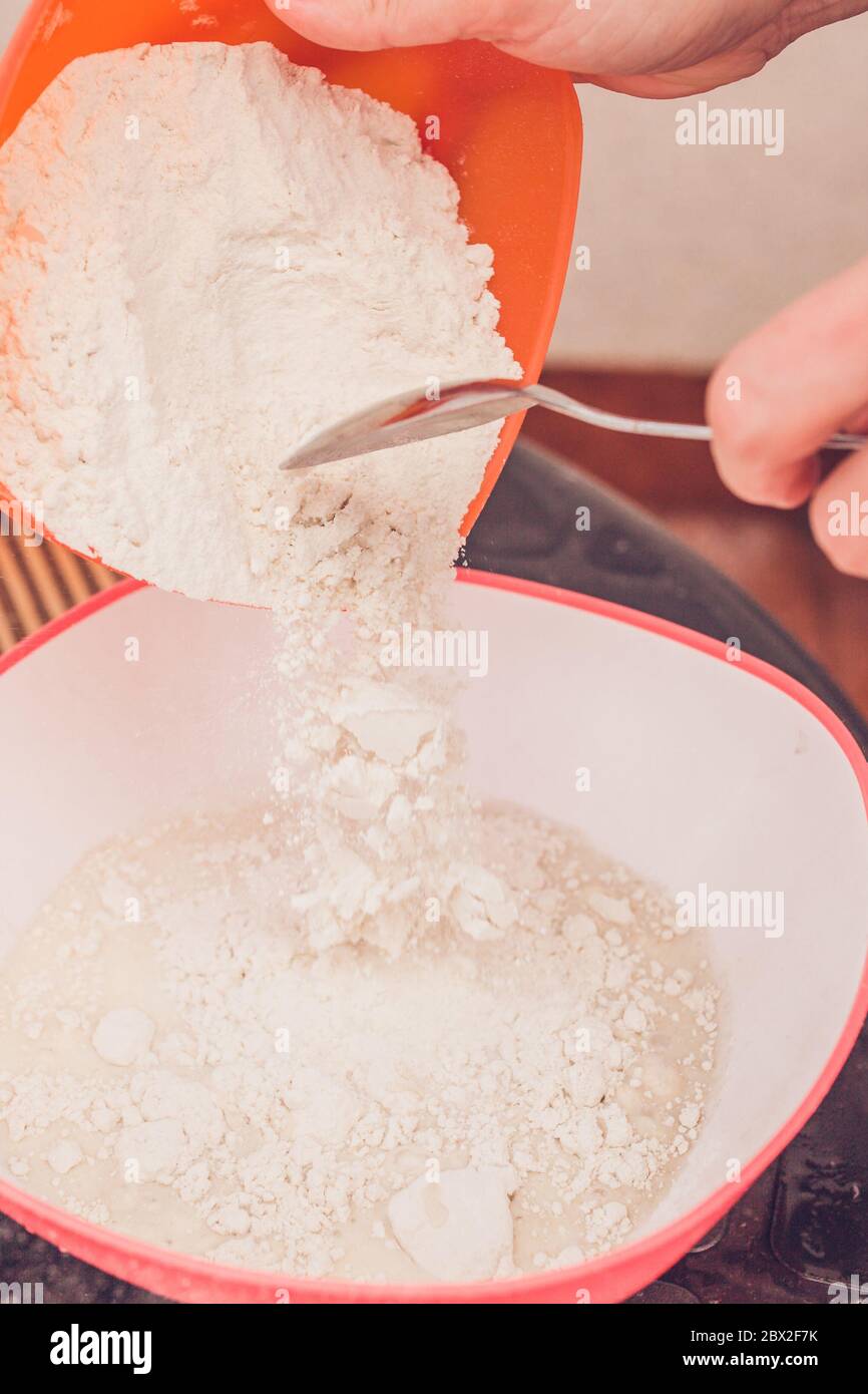 Adding flour to batter hi-res stock photography and images - Alamy