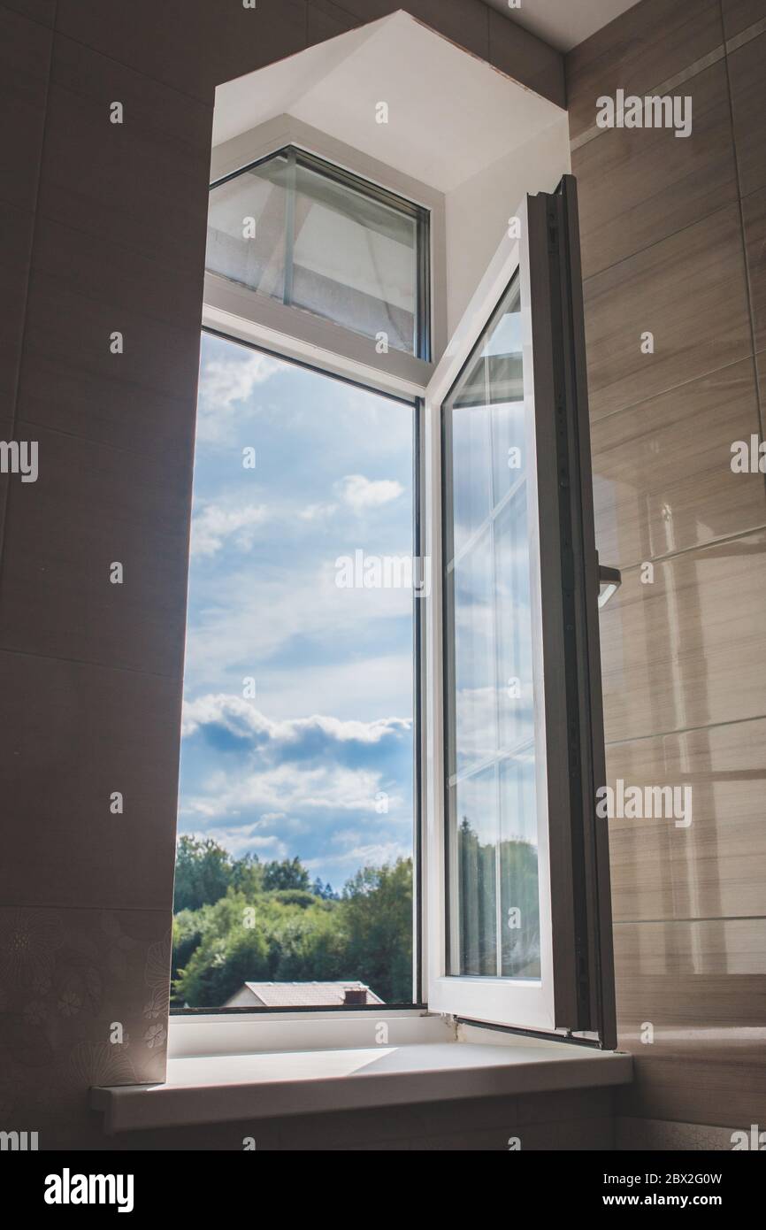 Bright light and freshness of the air into the house through the open ...