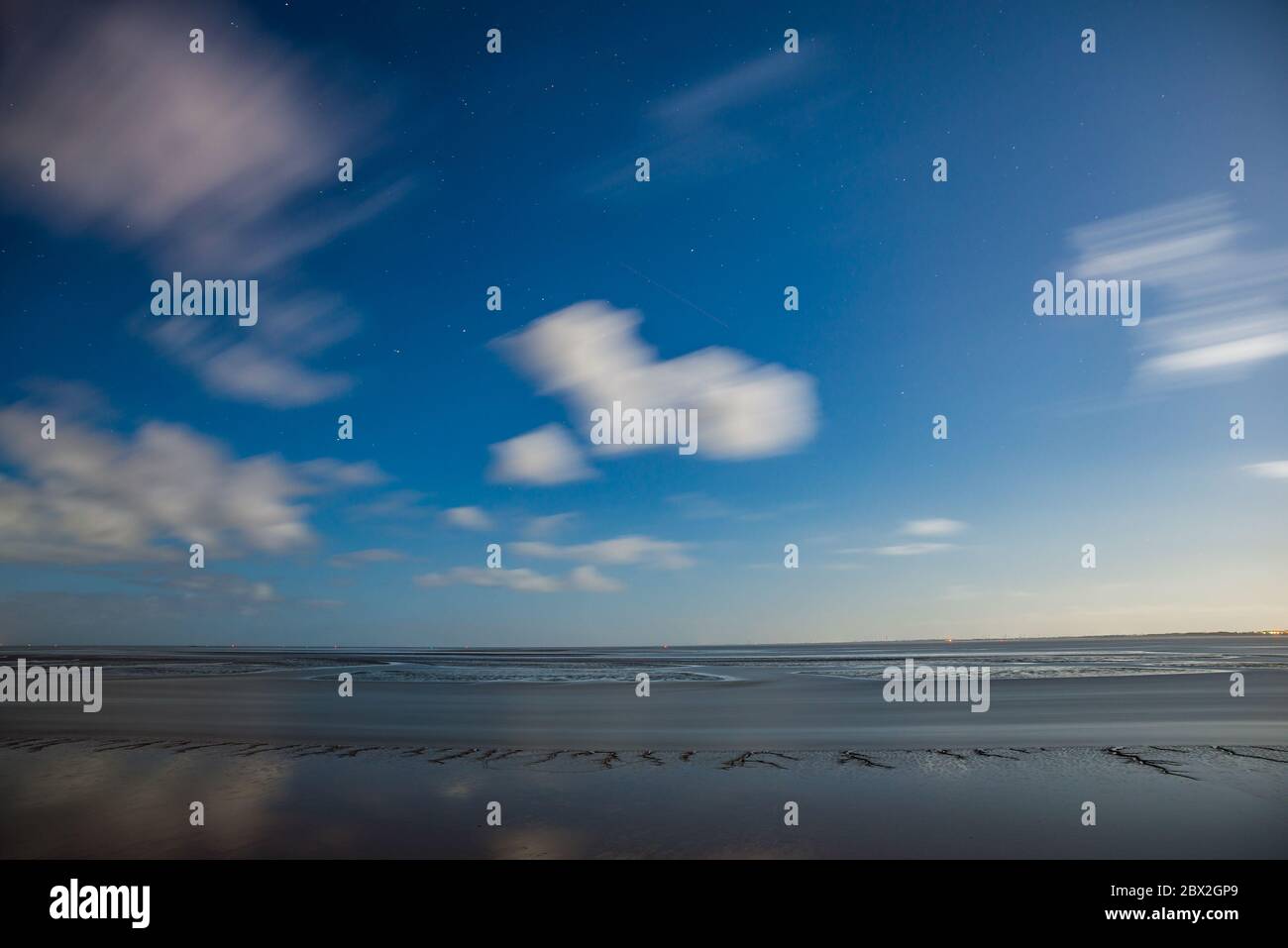 Night photo of Ems river on long exposure at low tide in Delfzijl ...