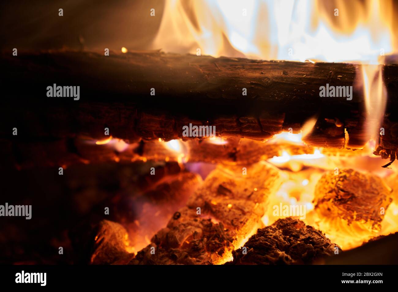 Wood on fire in the fireplace Stock Photo - Alamy