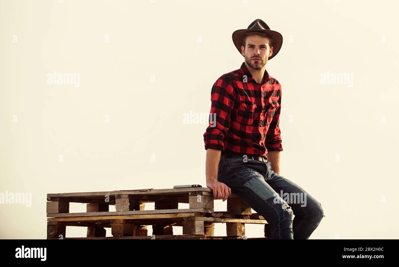 from the country. Vintage style man. Wild West retro cowboy. cowboy sit ...