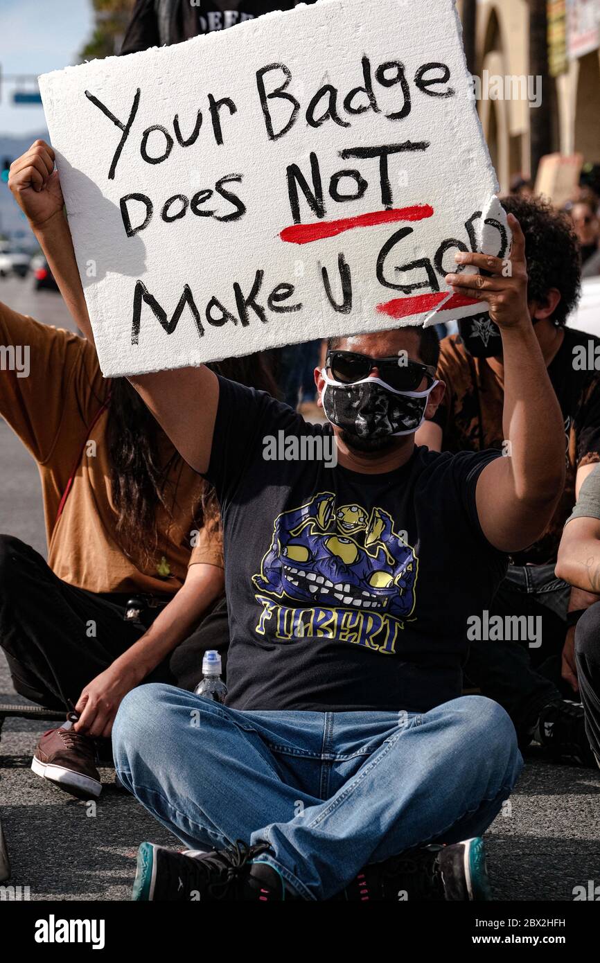Los Angeles, California, USA. 1st June, 2020. Protestor holds a banner ...