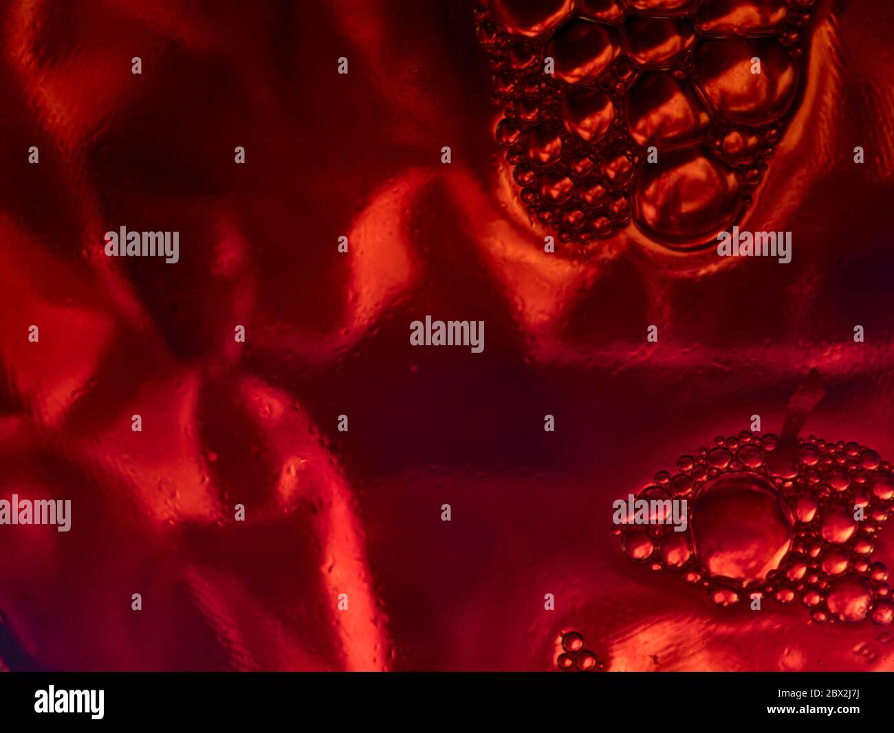 Symphony in red, bubbles still-life also symbolising beauty and the ...