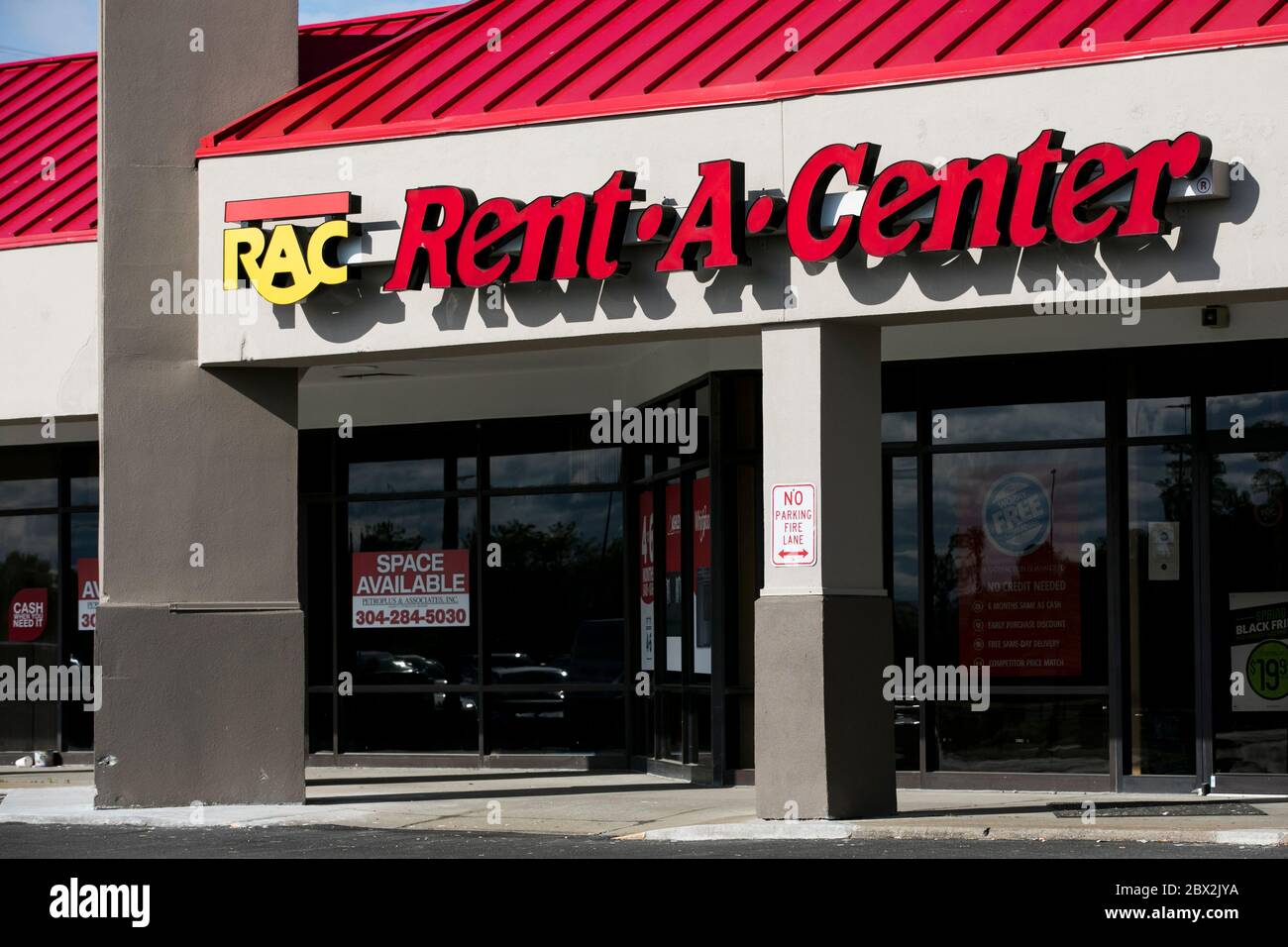 A logo sign outside of a Rent-A-Center store location in Morgantown ...