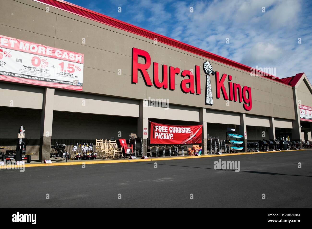 A logo sign outside of a Rural King Supply retail store location in ...