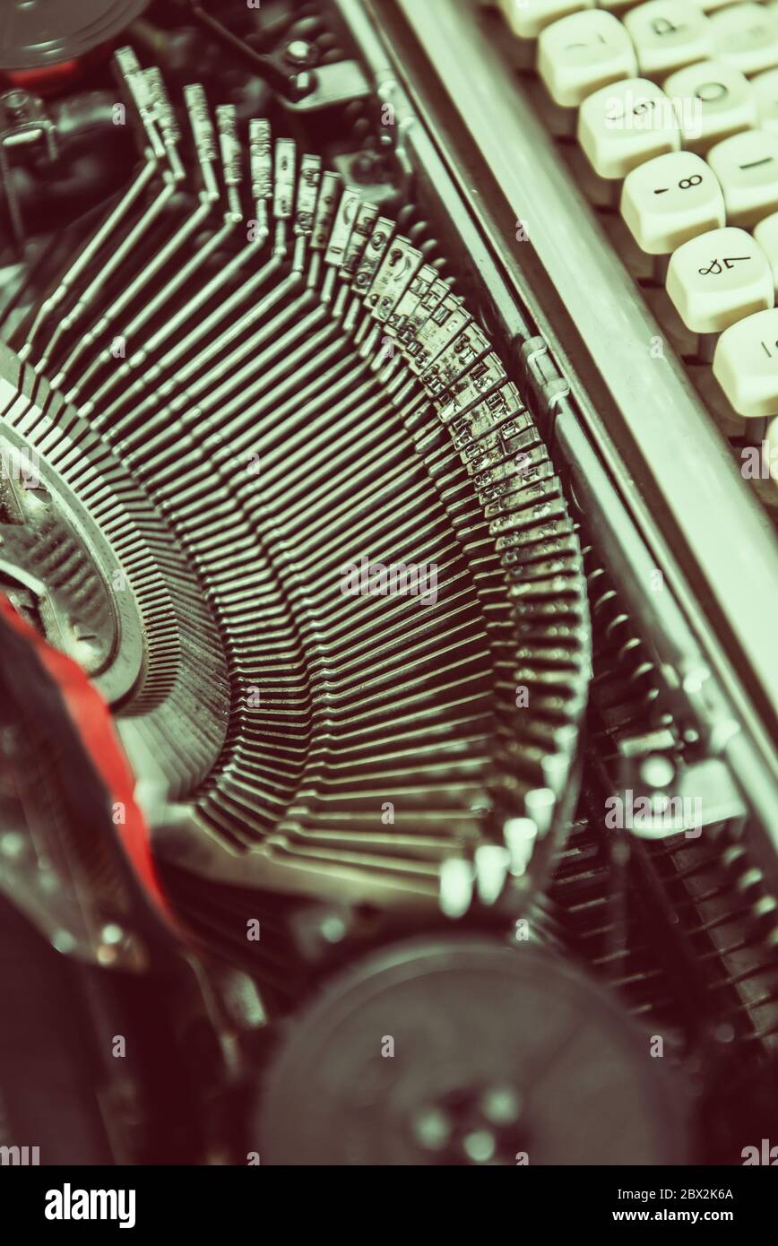 Detail of the metal type bars on an old typewriter Stock Photo - Alamy