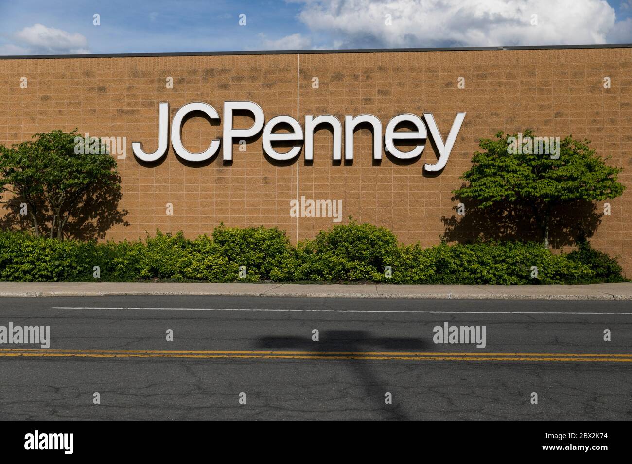 A logo sign outside of a JCPenney retail store location in Cumberland ...