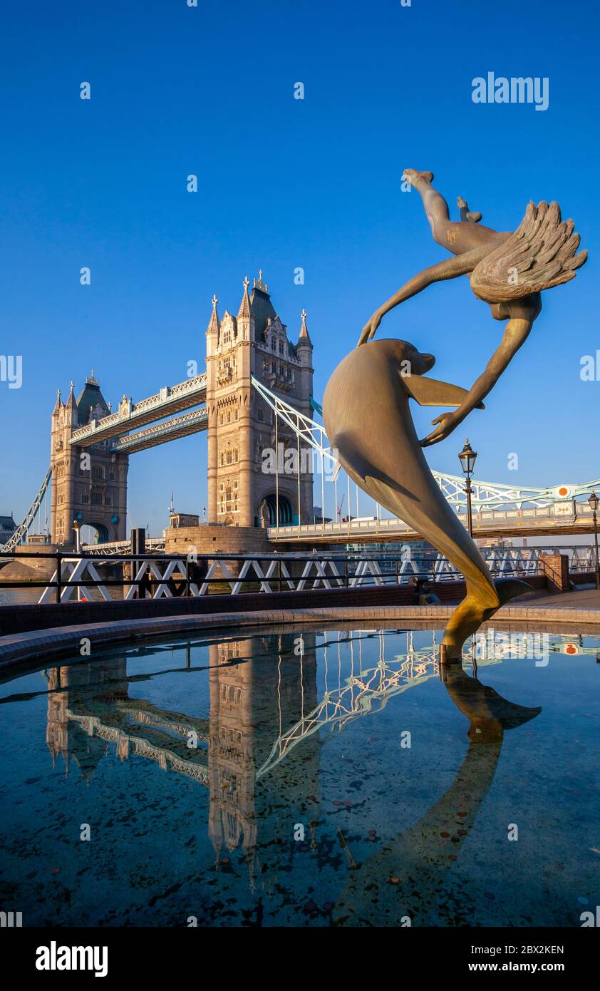 Girl with a Dolphin and Tower Bridge, London, England, UK Stock Photo ...