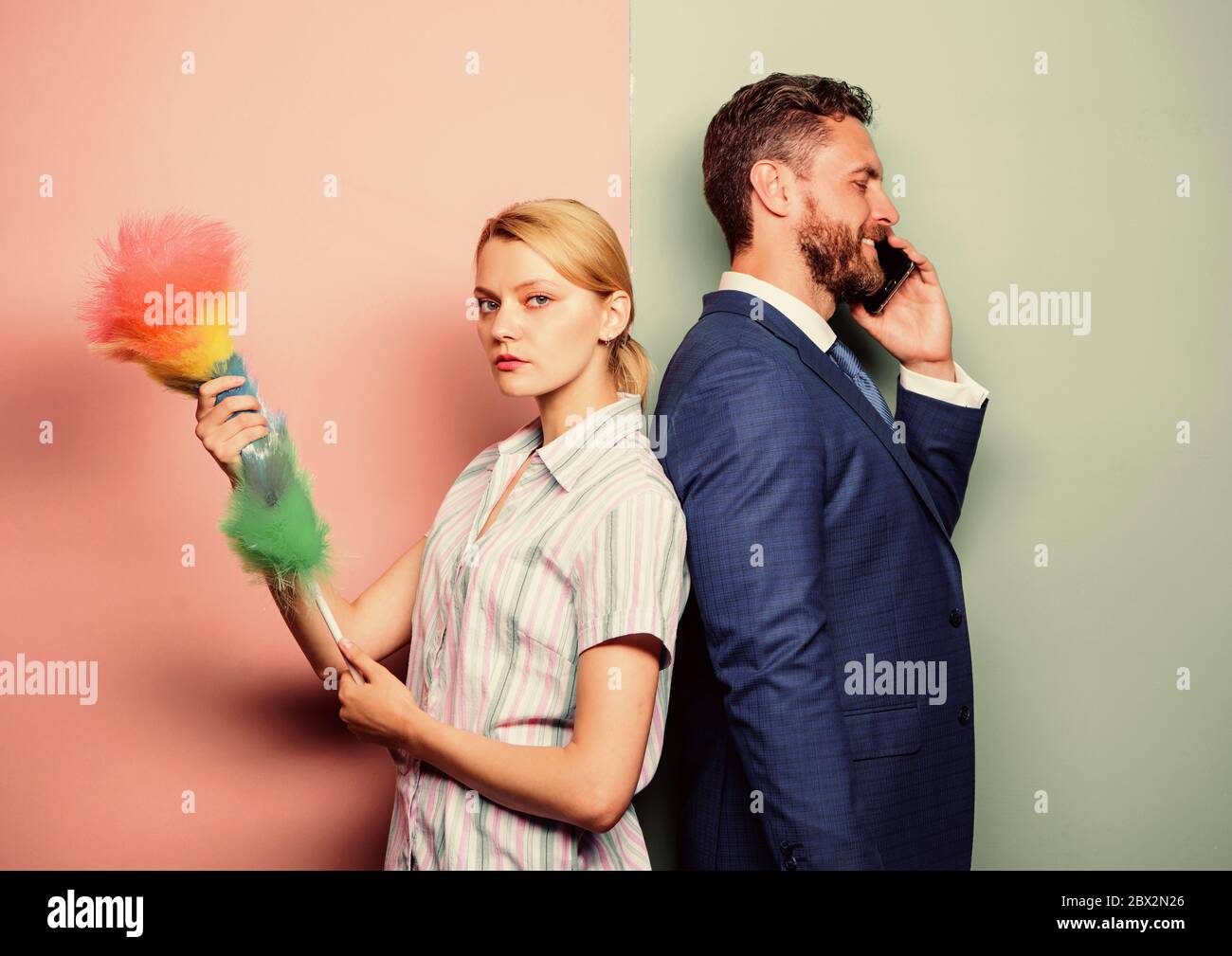 Housekeeping routine. Couple man and woman team. Housekeeping or ...