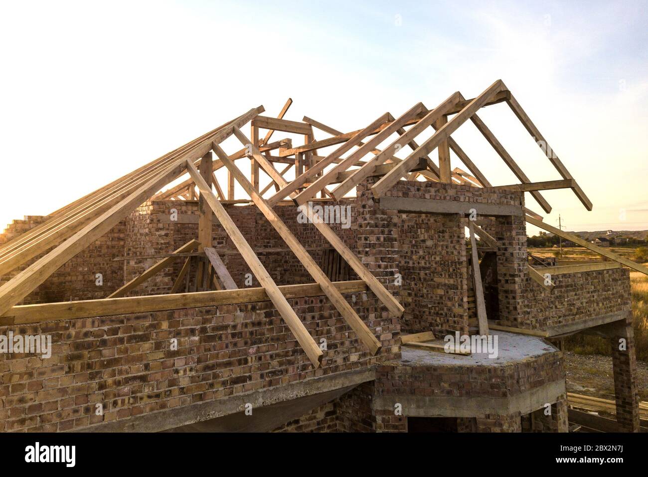 Private residential house with wooden roof frame structure under ...