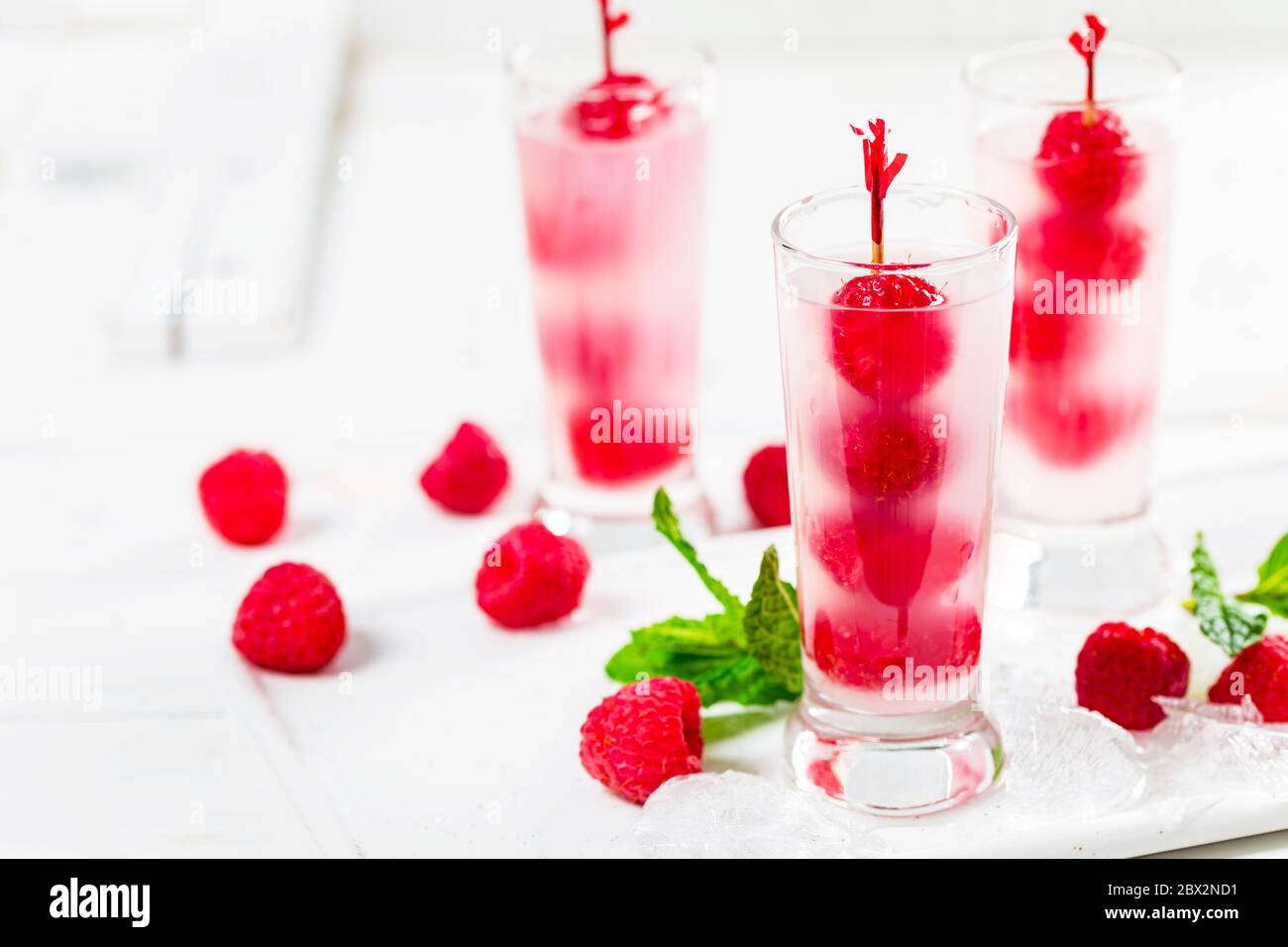 Raspberry Vodka Shots Lemonade Cocktail with Fresh Raspberry on White ...