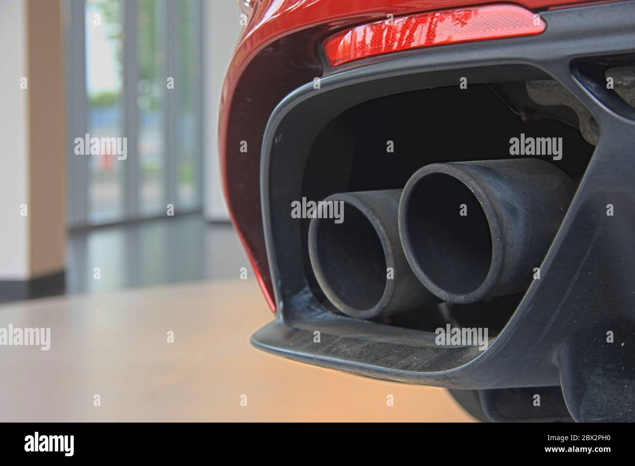 Car twin exhausts Stock Photo - Alamy