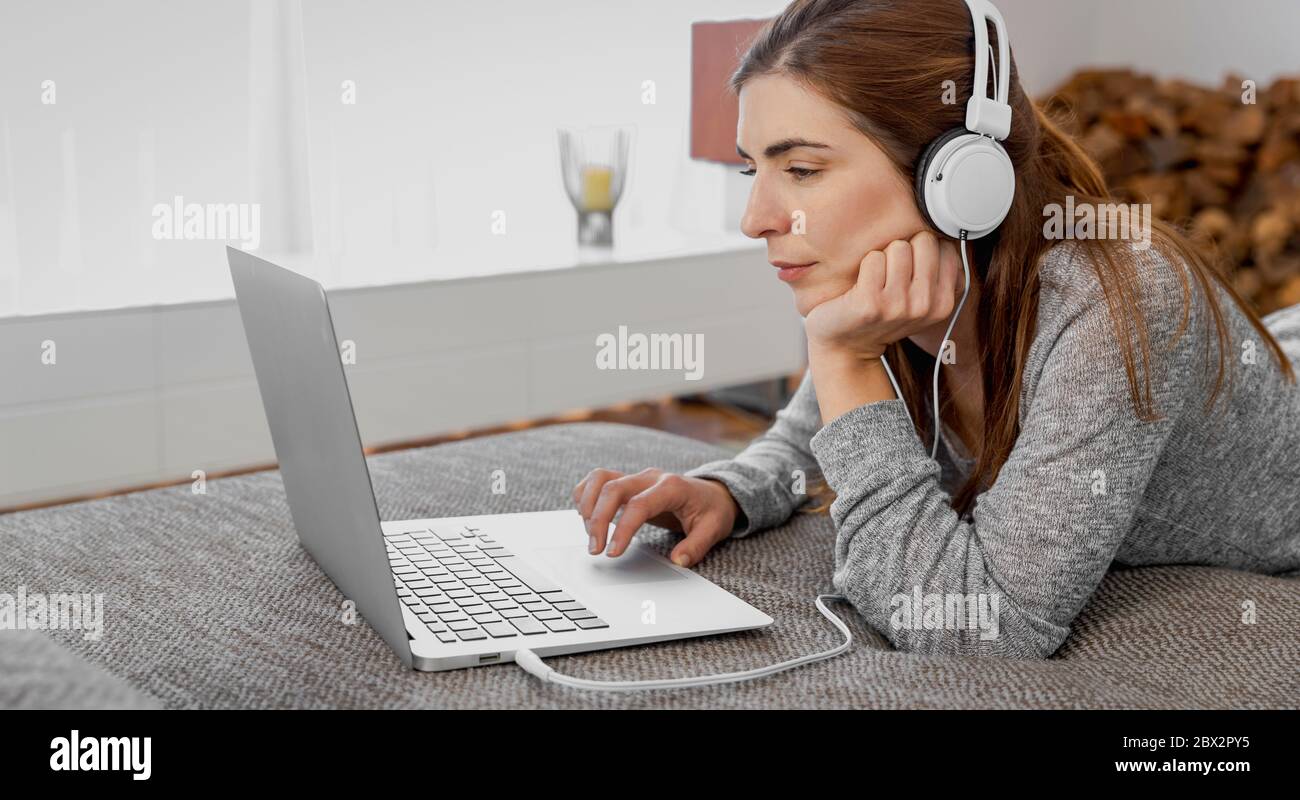 Working at home while listen music Stock Photo - Alamy