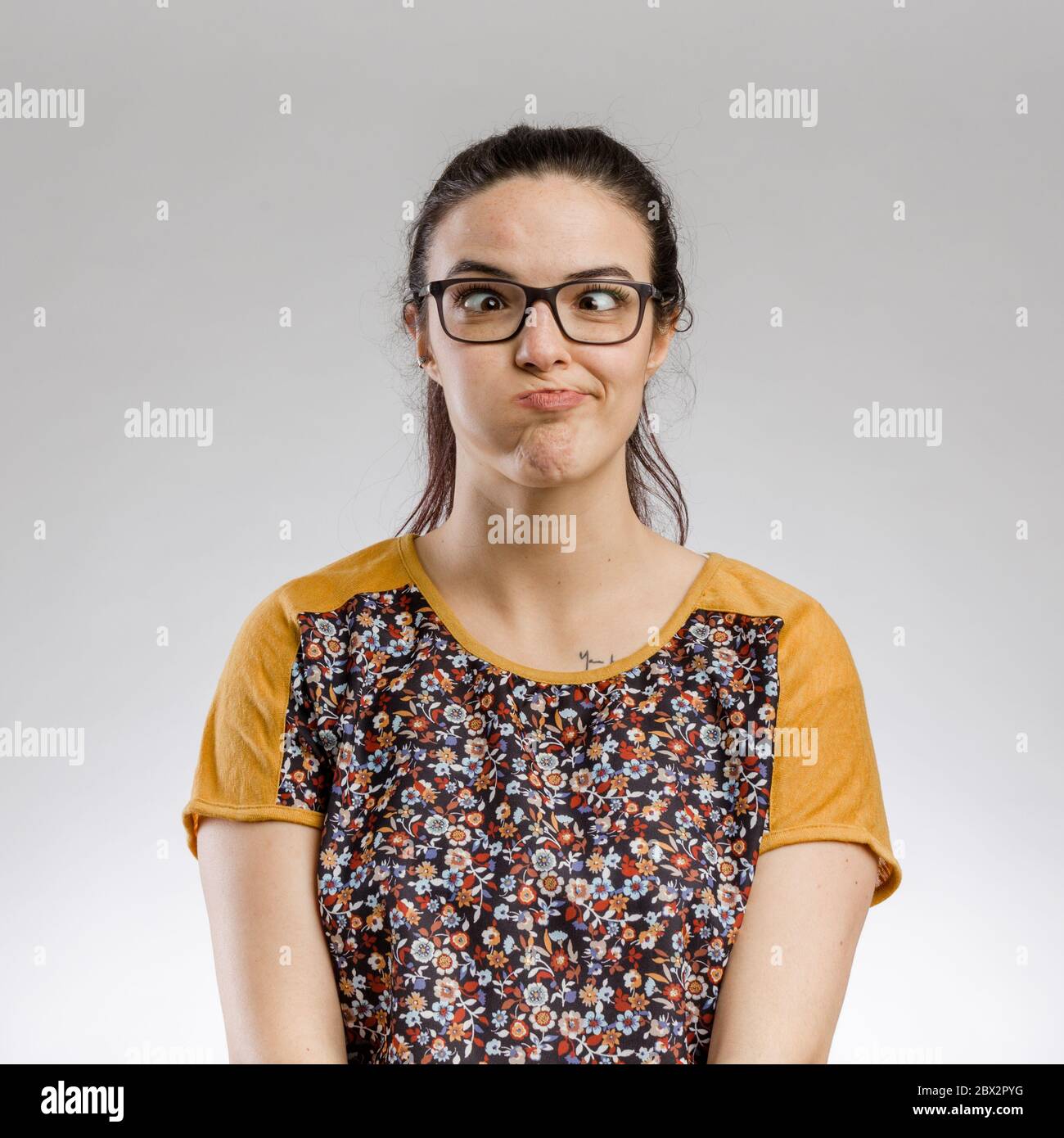 Funny Portrait of a girl making a silly face Stock Photo - Alamy
