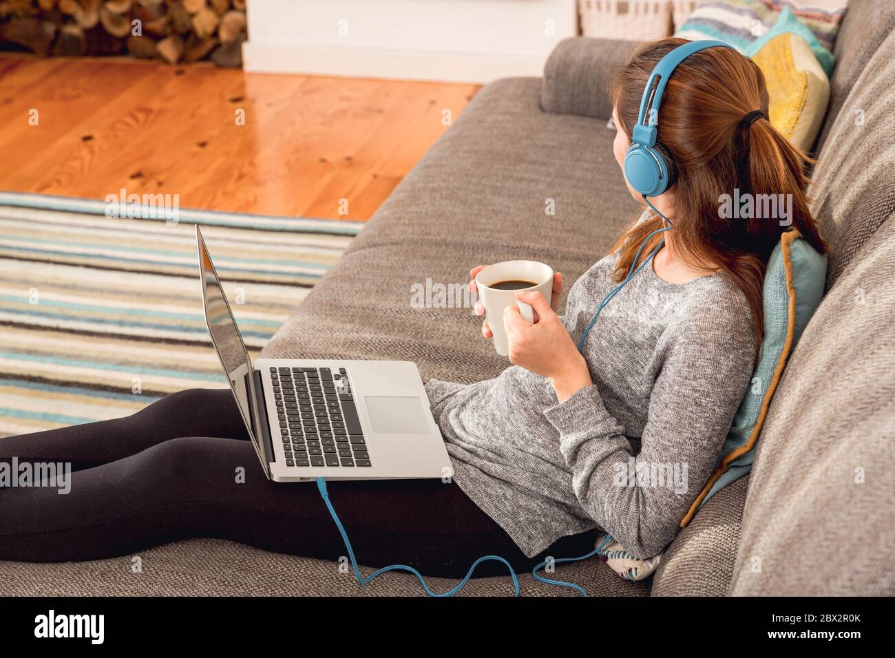 Working at home while listen music Stock Photo - Alamy