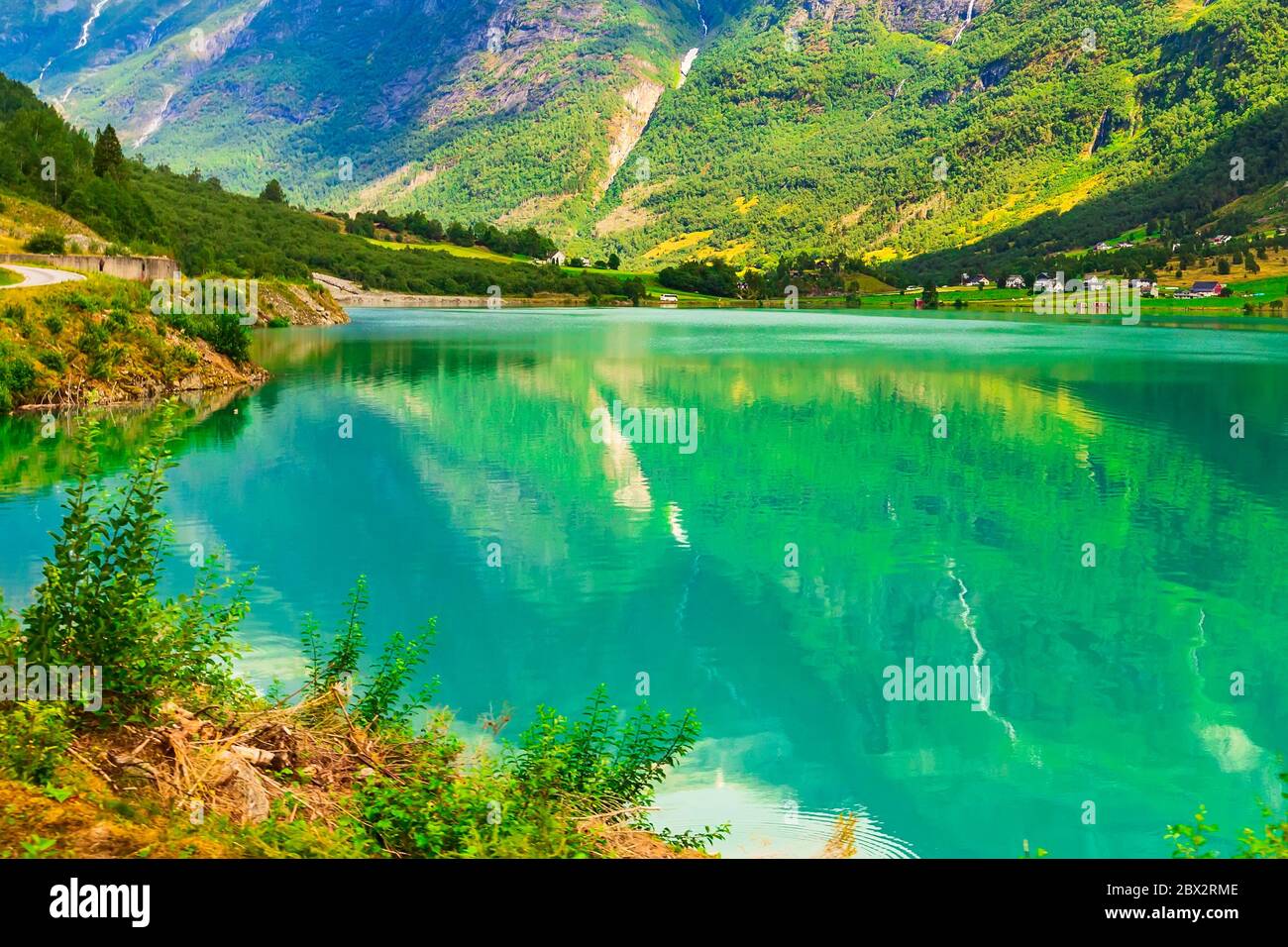 Norwegian landscape with Nordfjord fjord, mountains and waterfall ...