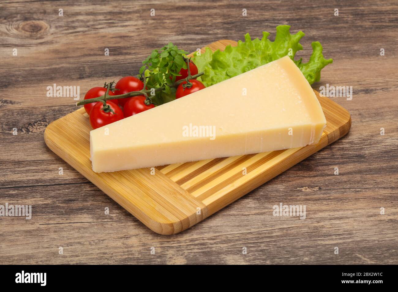 Italian traditional parmesan cheese triangle served salad Stock Photo ...