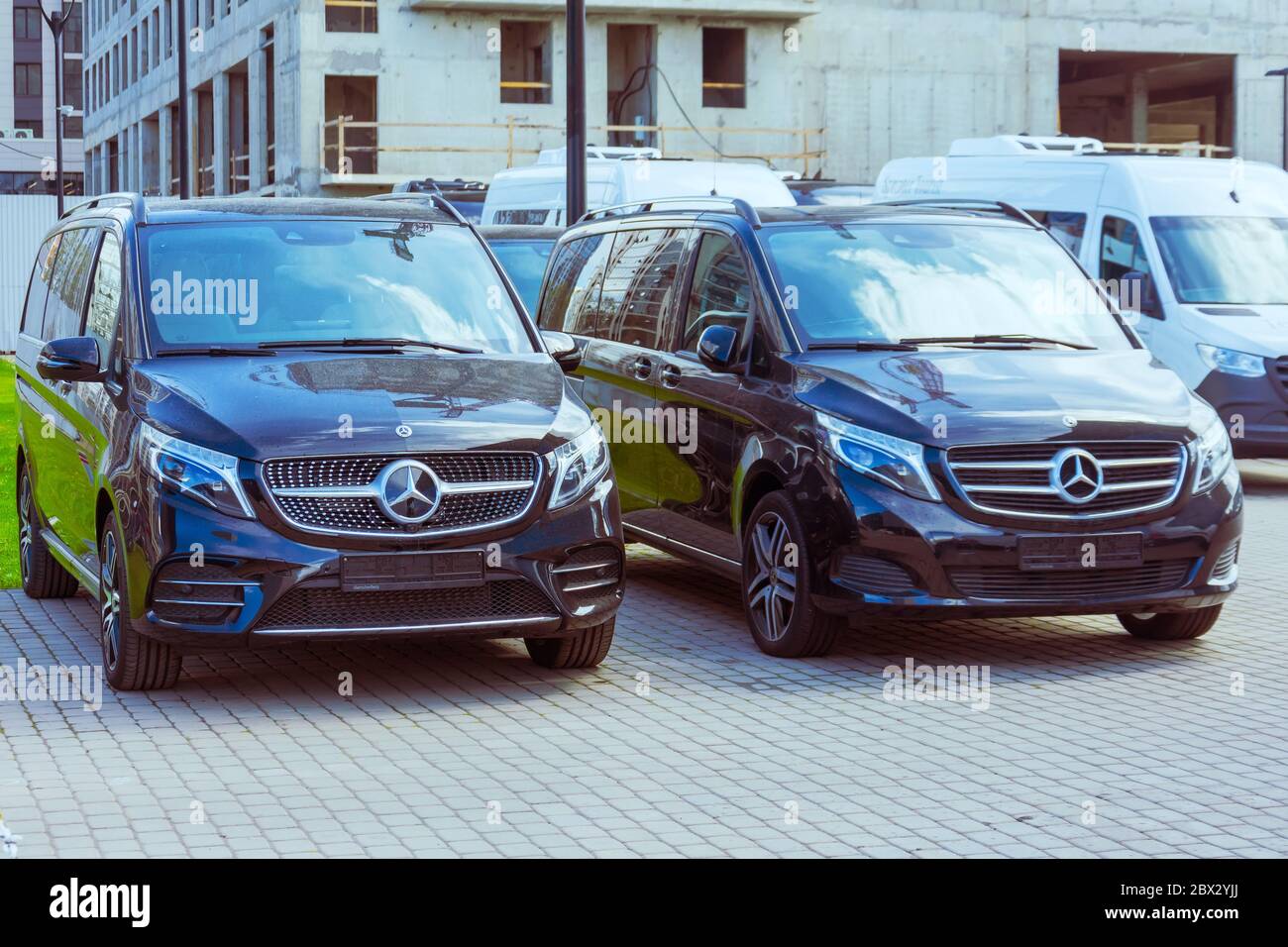 Black Mercedes-Benz V class, front view minivan in a parking lot ...