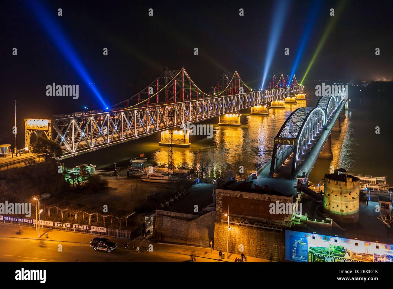 China, Liaoning Province, Dandong City, night view of the Broken Bridge ...