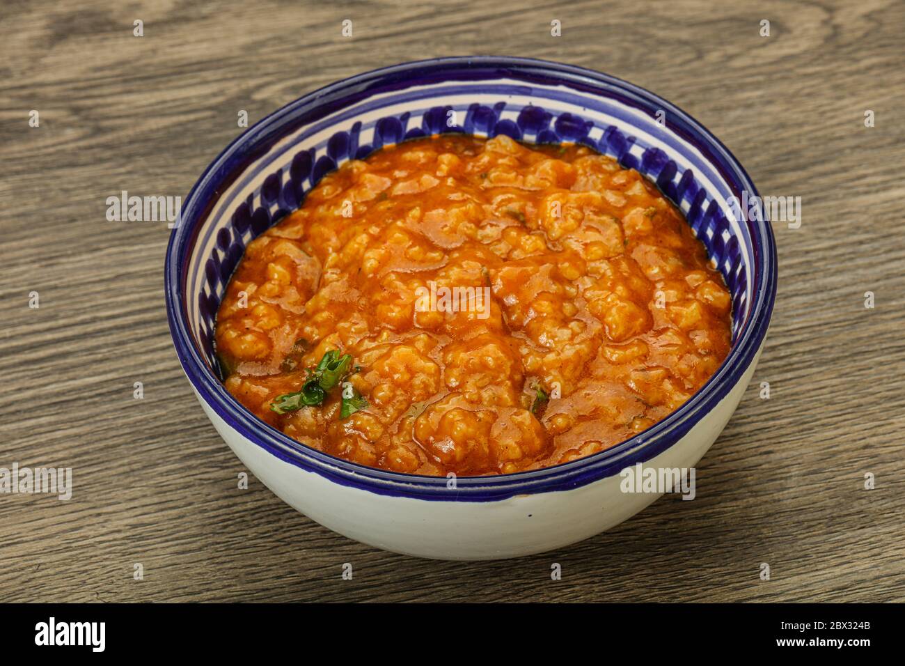 Traditional Georgian Kharcho soup with meat and spices Stock Photo - Alamy