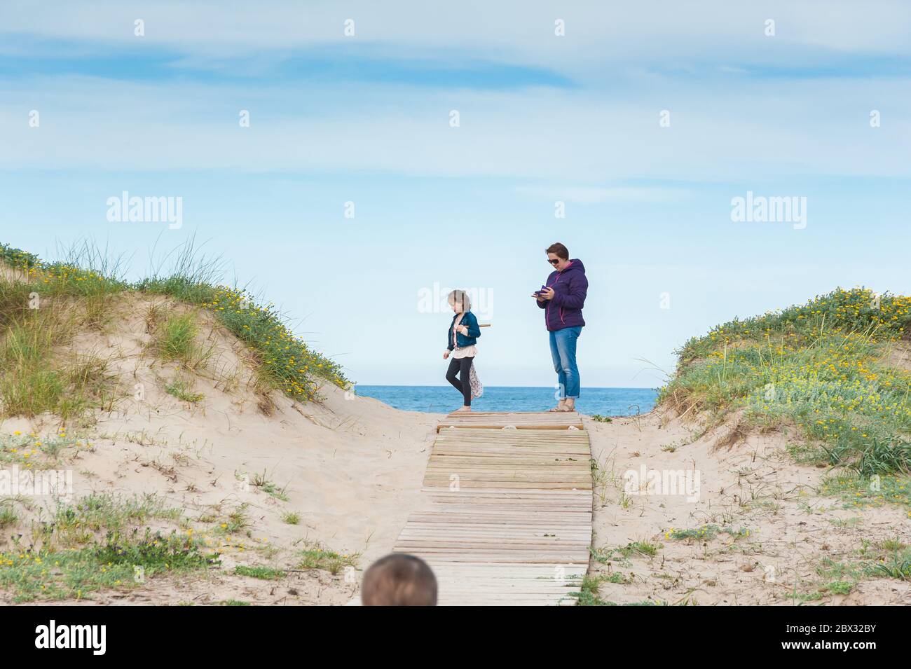 Child playing seaside spring hi-res stock photography and images - Alamy