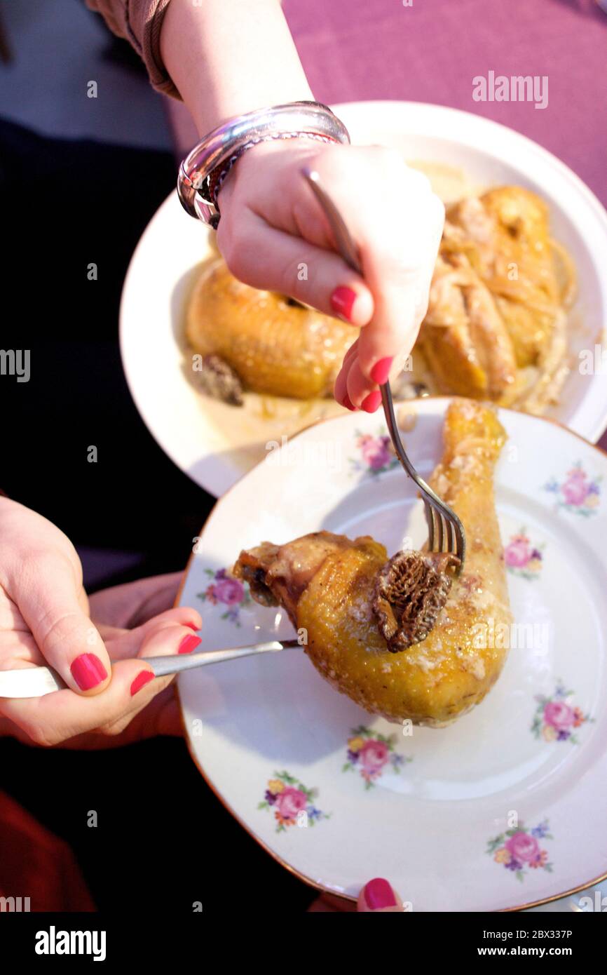 Chicken service in yellow wine Stock Photo - Alamy