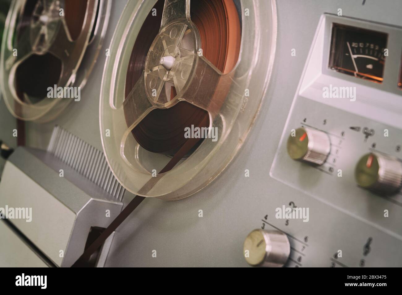 Old vintage reel-to-reel player. Tape recorder with spools. Bobbin tape ...