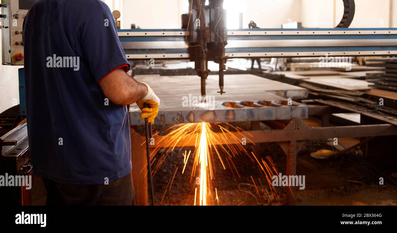CNC laser cutting metal sheet Stock Photo - Alamy