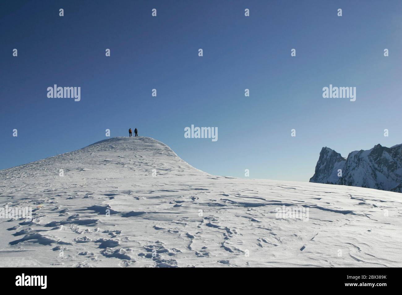 France, Haute Savoie, Chamonix-Mont-Blanc, Massif du Mont Blanc, two mountaineers on the Midi ...