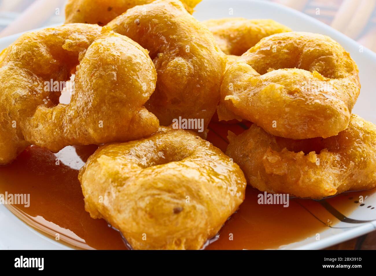 Picarones: These are ring-shaped dessert made with wheat flour dough ...