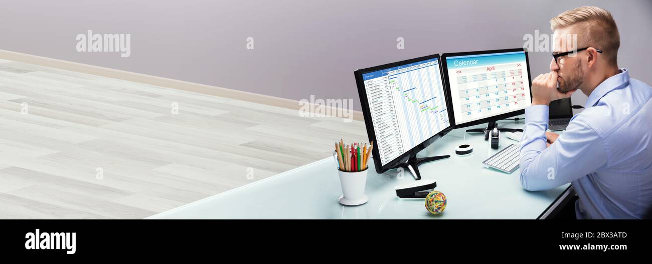 Schedule On Computer Screen. Employee Looking At Calendar Stock Photo ...