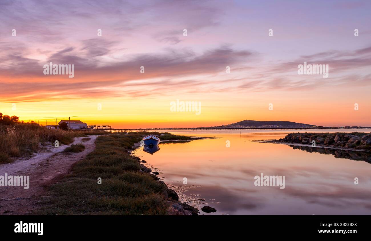 A calm morning on the Thau lagoon near Mèze, at blue hour, in Hérault ...