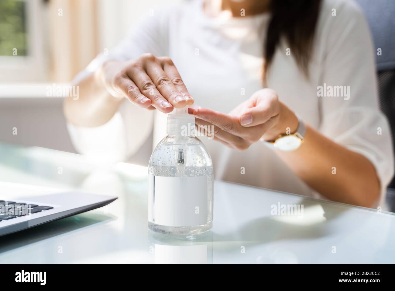 Woman Using Alcohol Handwash Disinfectant Gel For Hygiene Stock Photo ...