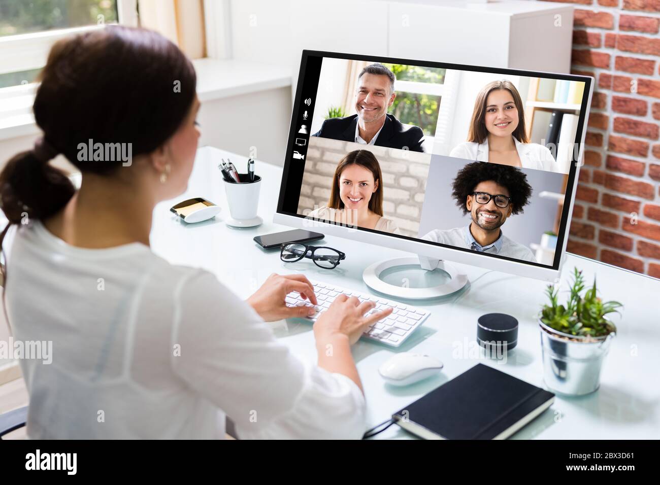 Businesswomen having video conference office hi-res stock photography ...