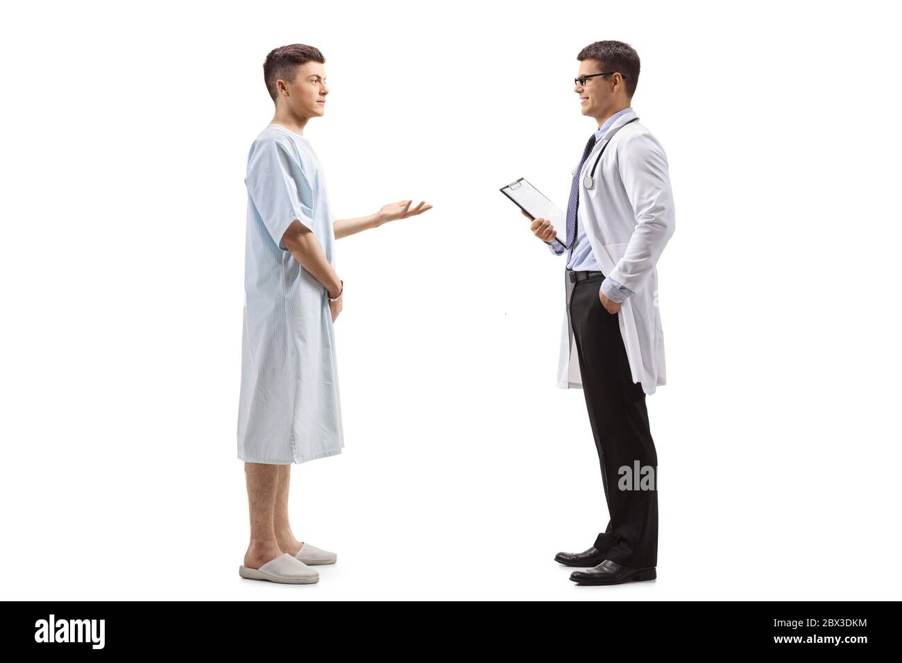 Full length profile shot of a young male patient talking to a doctor ...