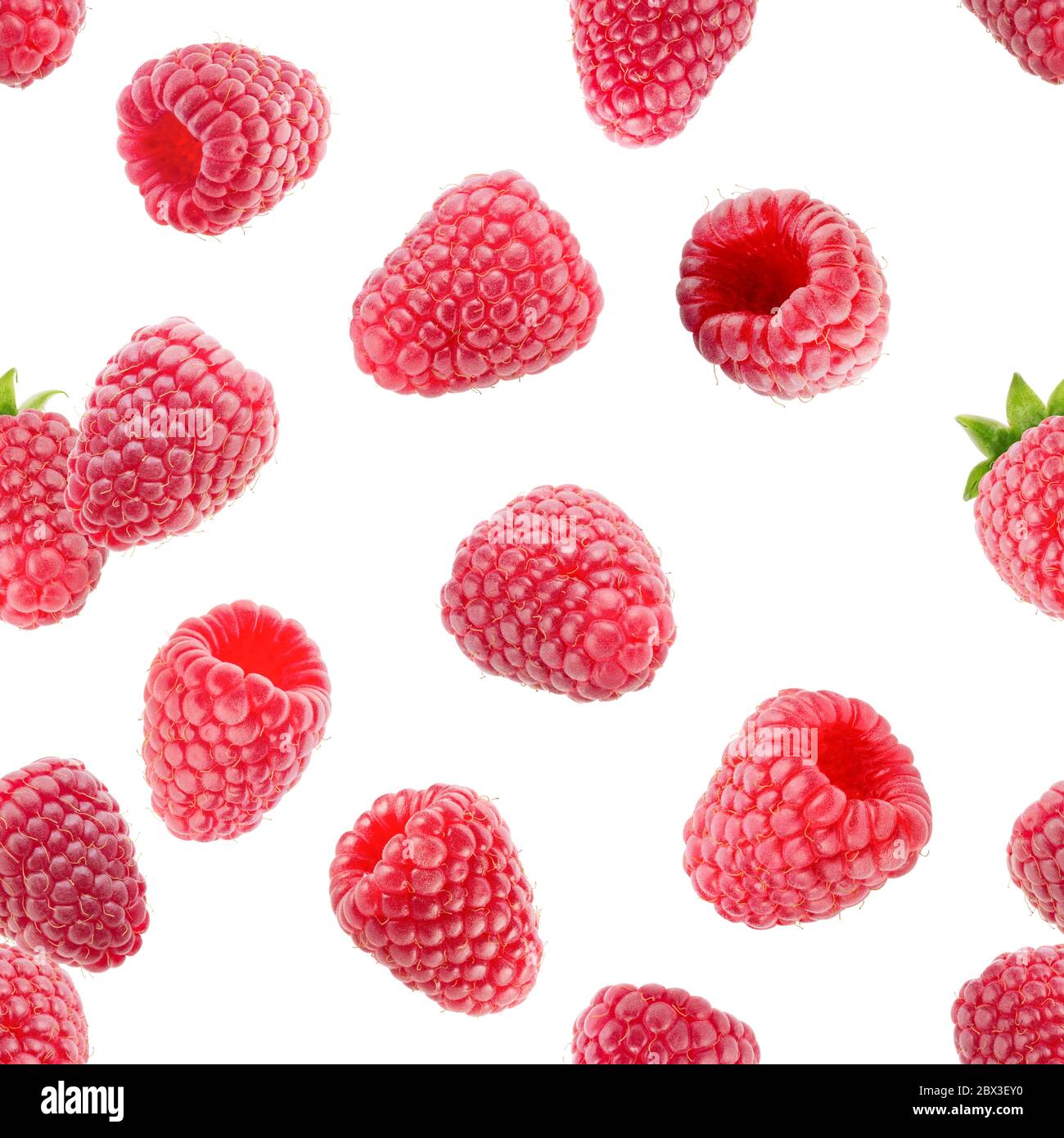 falling raspberries isolated on a white background Stock Photo - Alamy