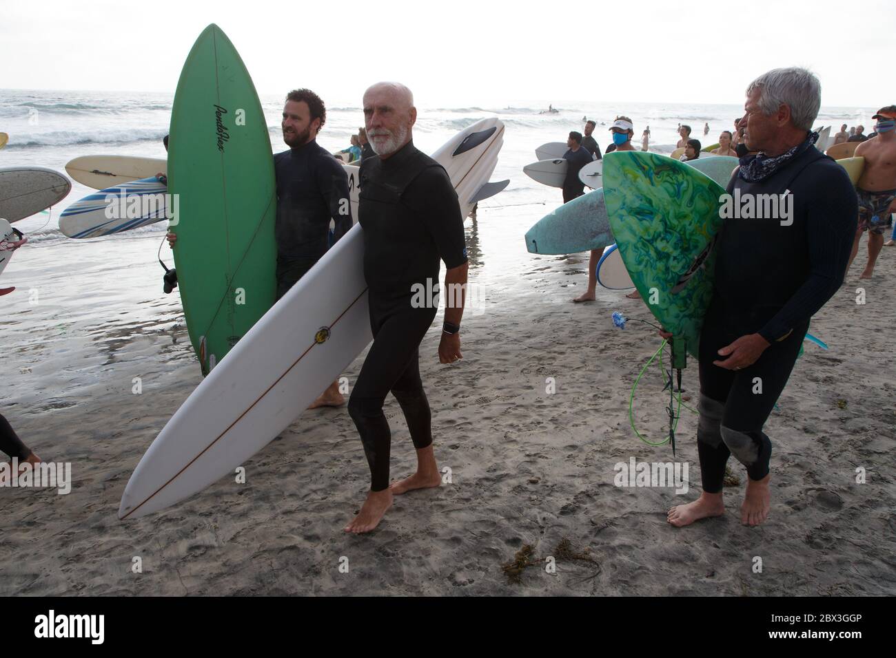 Grey haired man with surfboard hi-res stock photography and images - Alamy