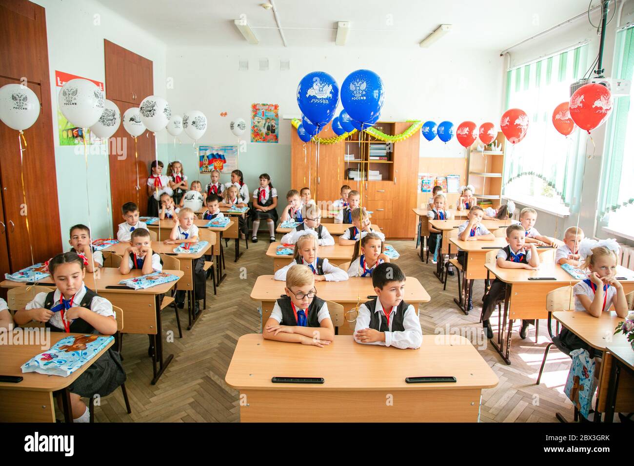Little first-grader, girl-student goes to school on knowledge day ...