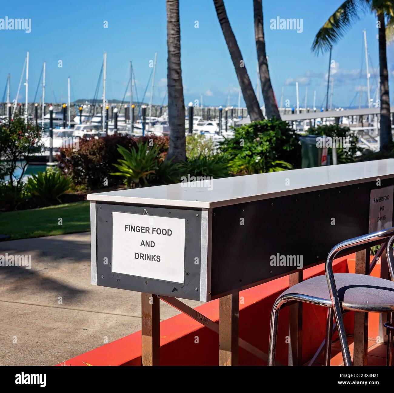 Sign for finger food and drinks available at outdoor cafe at marina ...
