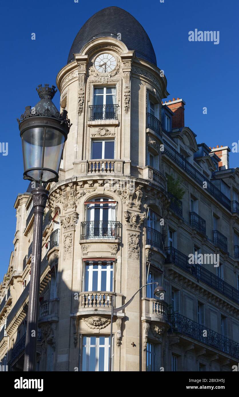 Traditional French house with typical balconies and windows. Paris ...