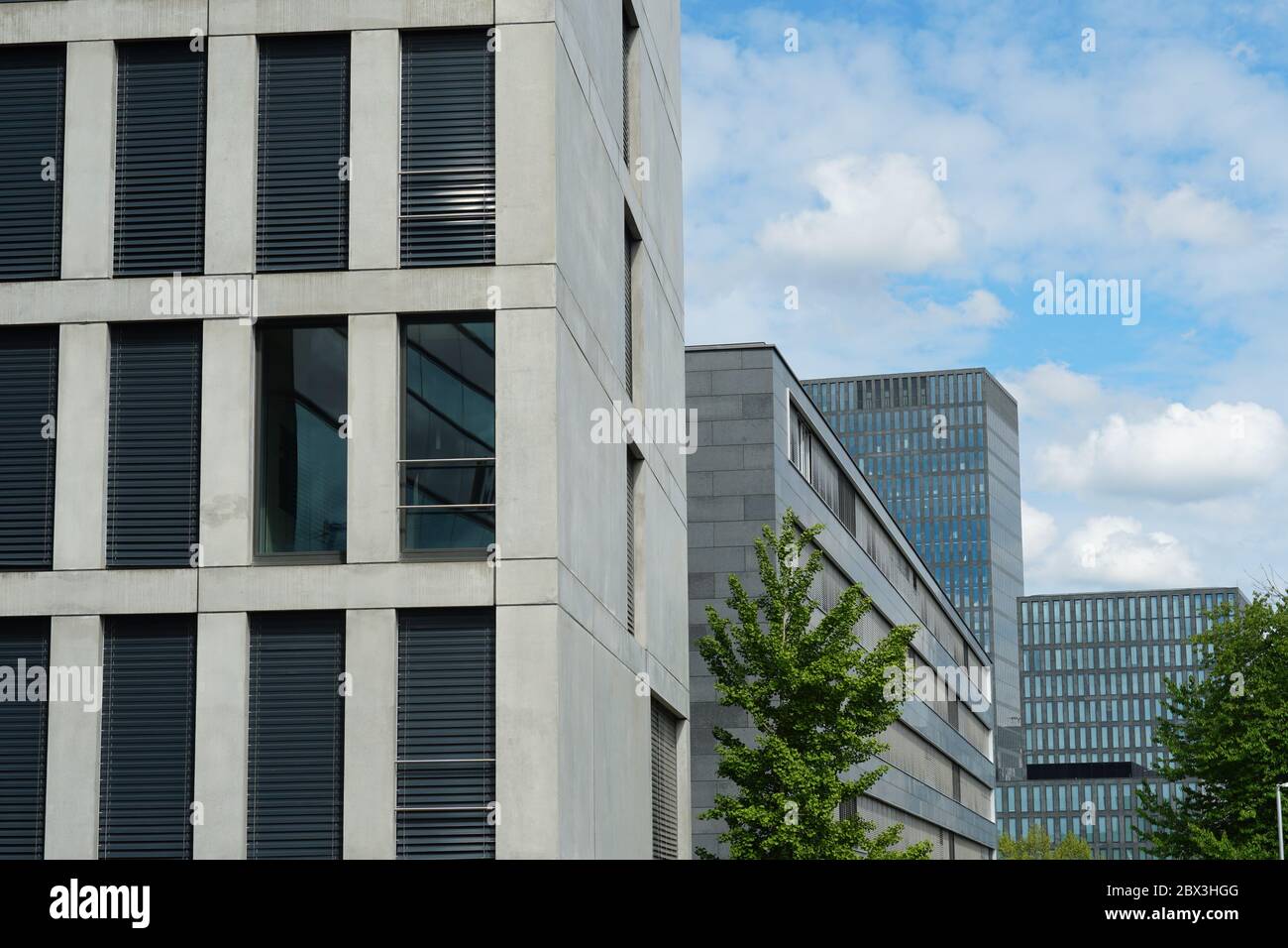 modern office buildings with glass facades and big windows constructed ...