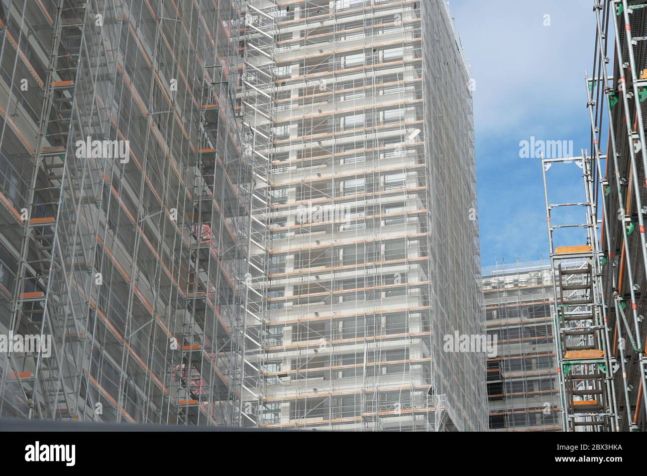 Construction of a new residential district with tall building covered ...